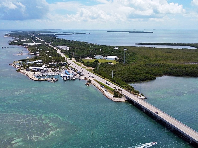 Islamorada's stunning aerial view showcases the brilliant blues of the Florida Keys, where land meets water in a spectacular display.