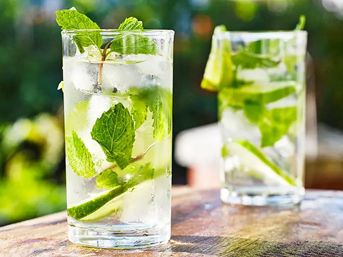 Crystal clear and bursting with fresh mint, this authentic mojito captures the essence of Key West in every refreshing sip.