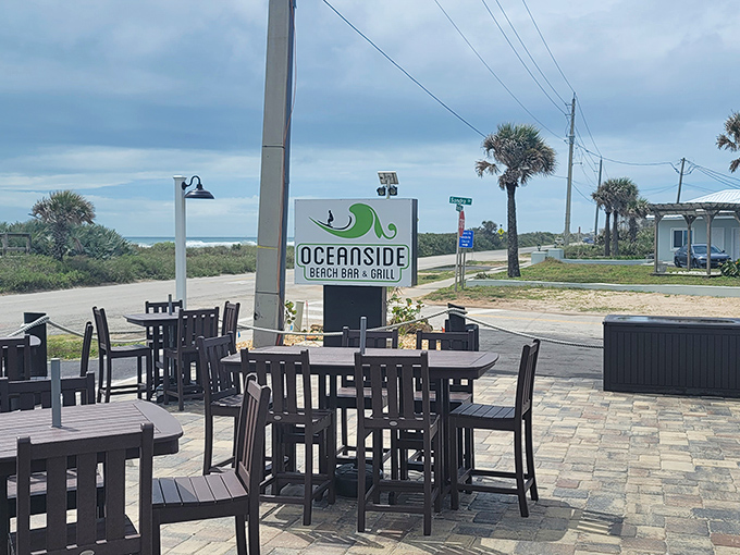 The outdoor dining area at Oceanside Beach Bar & Grill puts nothing between you and the Atlantic Ocean except your table.