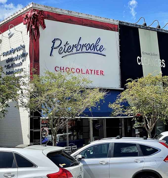 The classic Peterbrooke sign has been drawing chocolate lovers inside for years with its timeless charm and sweet reputation.