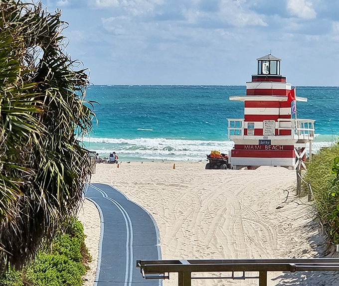 Miami Beach's iconic red and white lifeguard stand watches over turquoise waters and sugar-sand beaches. Postcard perfection without filters!
