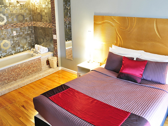 Bathtubs with a view? Yes, please! This luxurious soak spot blends vintage charm with modern indulgence, making "prune fingers" a fashion statement.