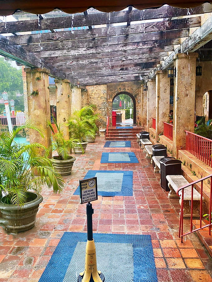 Time-worn columns and rustic benches line the promenade, whispering stories of Gatsby-era glamour to modern-day visitors.