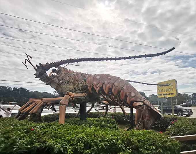 Even under moody skies, Betsy maintains her cheerful presence, proving that a giant lobster's charm transcends weather conditions and brightens any day.