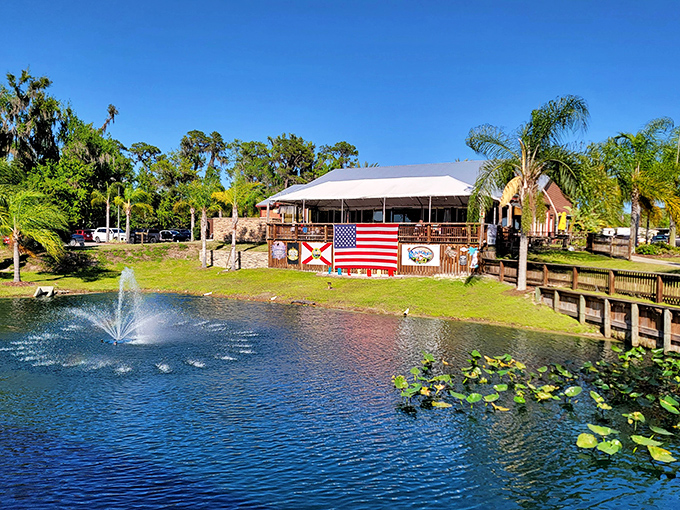 The fountain creates a tranquil focal point, its gentle spray catching sunlight while offering a cooling mist on hot Florida afternoons.
