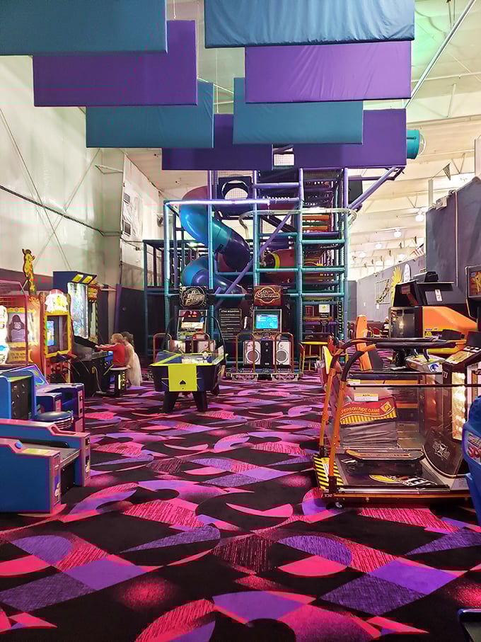 Neon lights transform the arcade into an electric wonderland where time seems suspended and high scores become personal quests.