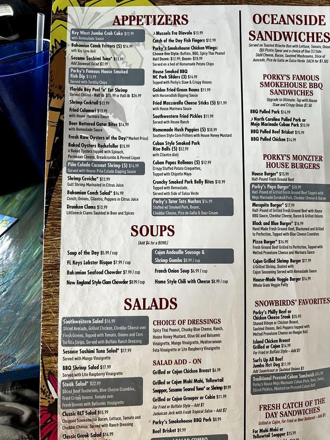 The menu reads like a love letter to BBQ and seafood &ndash; decisions, decisions! From conch fritters to smokehouse specialties, every choice promises satisfaction.