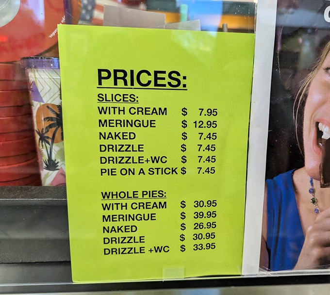 The menu board reveals the delicious dilemma facing every visitor &ndash; naked, with cream, or crowned with meringue?