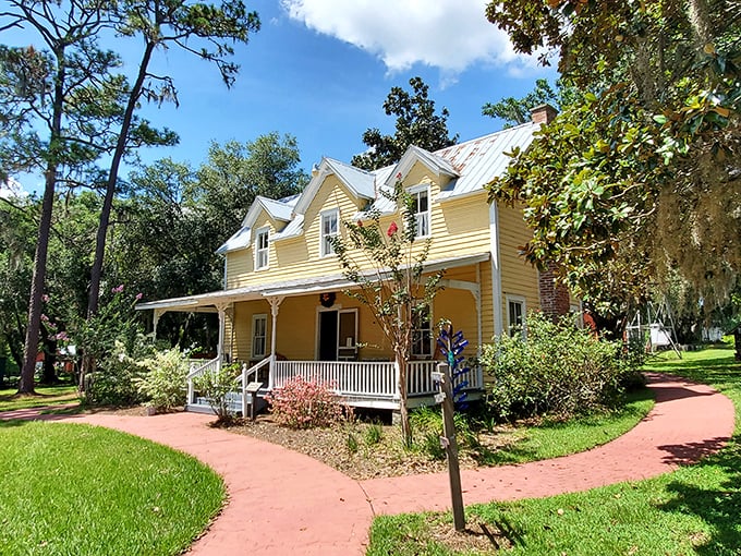 The cheerful yellow Overstreet House stands proudly as if saying, "I've survived over a century, what's your excuse?" A true architectural survivor with stories in every corner.