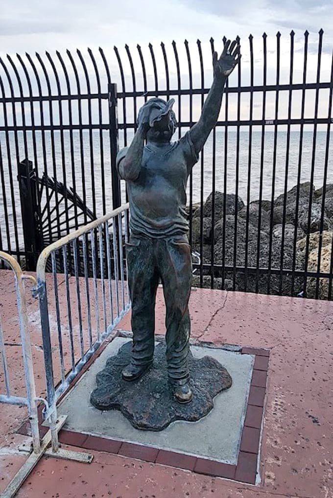 This bronze figure captures the universal gesture of reaching the edge of America and celebrating like Rocky on those Philadelphia steps.
