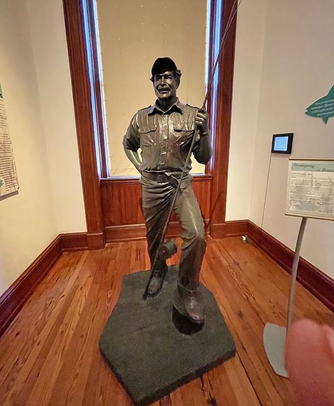 Papa Hemingway stands ready to judge your writing, your fishing skills, and probably your choice of cocktails too.