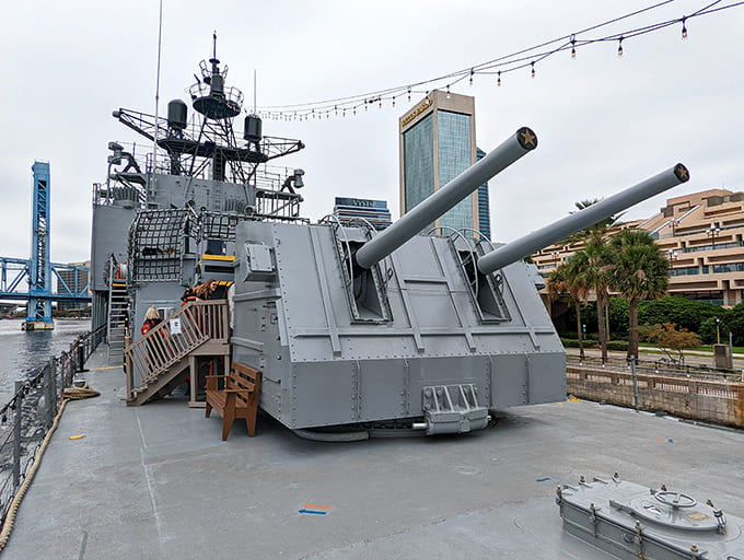 The deck bristles with authentic naval weaponry, reminding visitors this was a serious combat vessel, not a pleasure cruise.