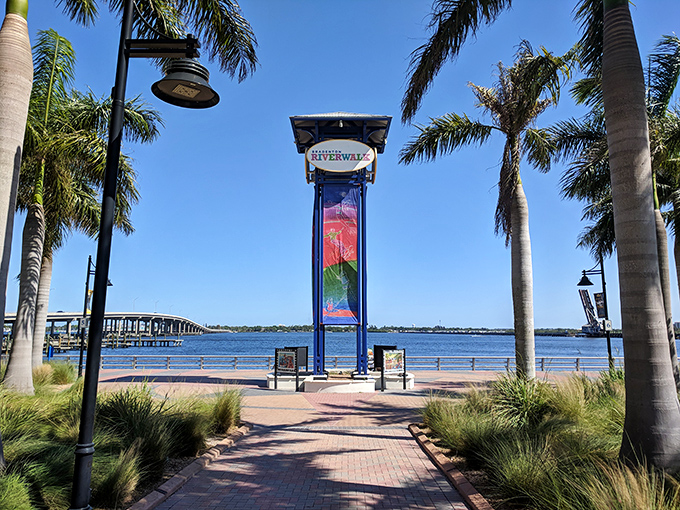The Riverwalk's tower plaza stands tall and proud, like that one friend who refuses to slouch despite years of being told to "stop showing off."