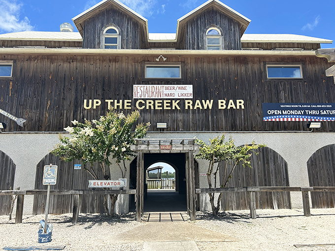 Up The Creek Raw Bar stands as a weathered wooden sentinel of seafood excellence&mdash;where oysters aren't just served, they're celebrated.