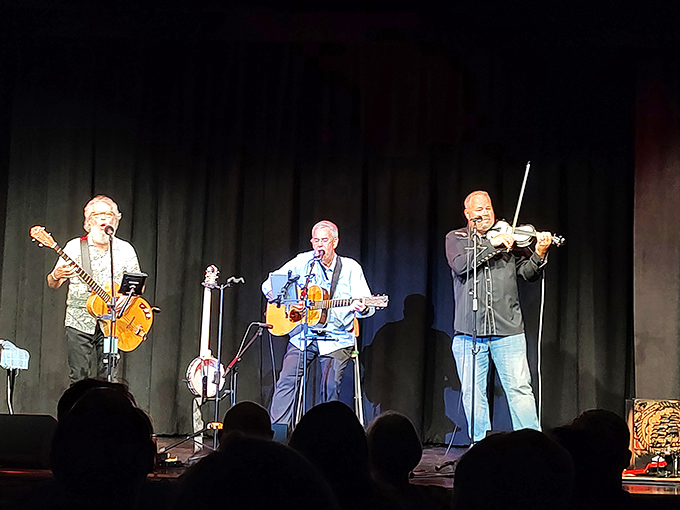 Musicians bring the historic stage to life with strings and harmony, proving some experiences simply can't be replicated through earbuds.