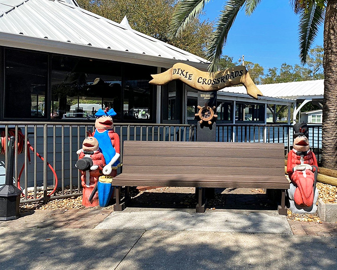 Dixie Crossroads' charming entrance features cartoon shrimp mascots that hint at the rock shrimp delights waiting inside.