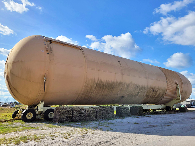 Space history meets Florida sunshine. The weathered exterior tells tales of engineering triumph and cosmic ambition while palm trees wave nonchalantly in the background.