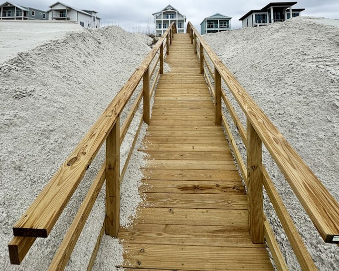 These wooden walkovers aren't just practical &ndash; they're portals to paradise, protecting fragile dune ecosystems while framing picture-perfect views of the Gulf.