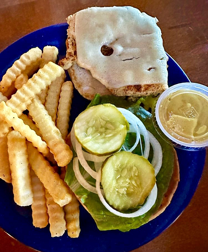 This blackened chicken sandwich isn't just food, it's therapy on a bun &ndash; crispy, juicy perfection with fresh veggies and a side of happiness.