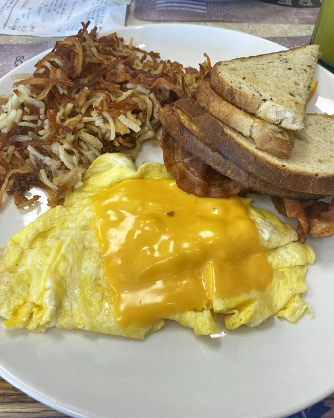 Cheese-draped eggs, perfectly crisped hash browns, and toast that actually tastes like something &ndash; breakfast fundamentals executed with respect.