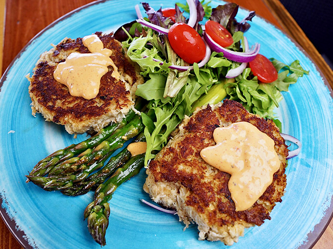 These crab cakes don't just have crab in them – they ARE crab, with barely enough binding to maintain their perfect disk shape.