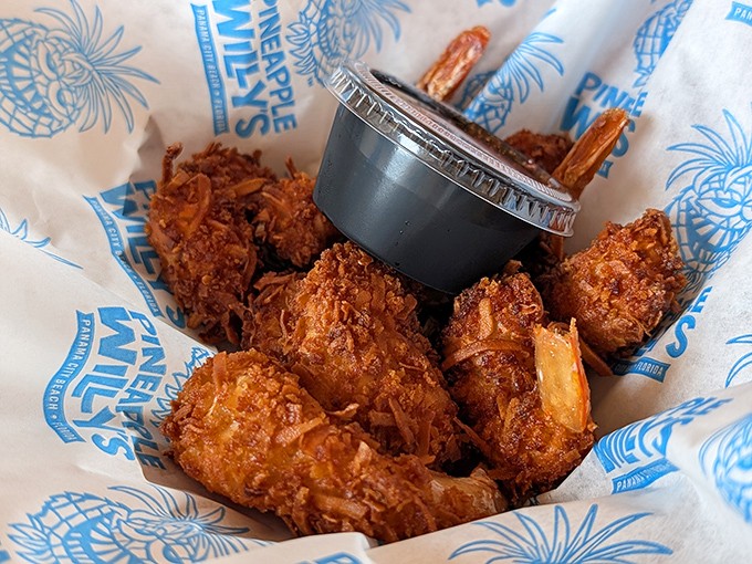 Golden-fried coconut shrimp that crunch like a perfect beach day &ndash; crispy outside, tender inside, and utterly irresistible with sweet dipping sauce.