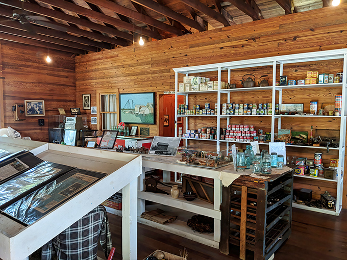 Inside this rustic time capsule, wooden beams and vintage shelving showcase everyday items that once represented the height of island luxury.