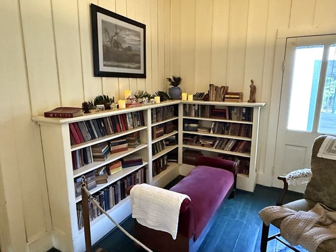 Her writing sanctuary remains ready for inspiration, books and typewriter positioned as if she just stepped out for a moment.