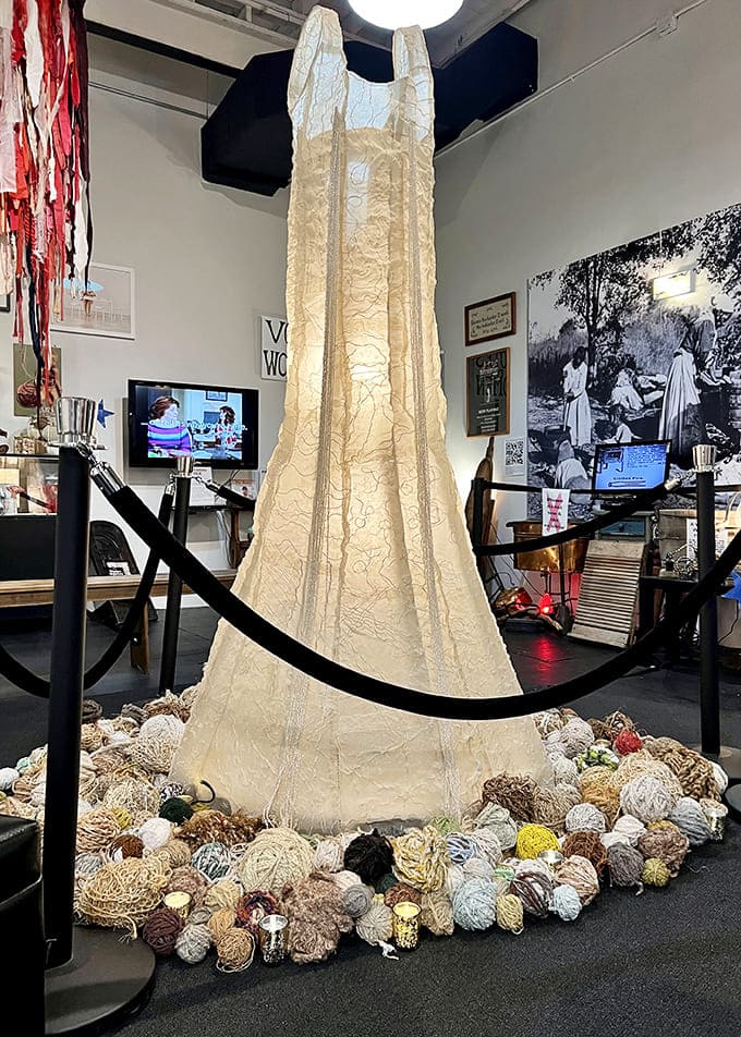 The Mother Tree sculpture stands tall, its roots spreading like the influence of maternal love through families.