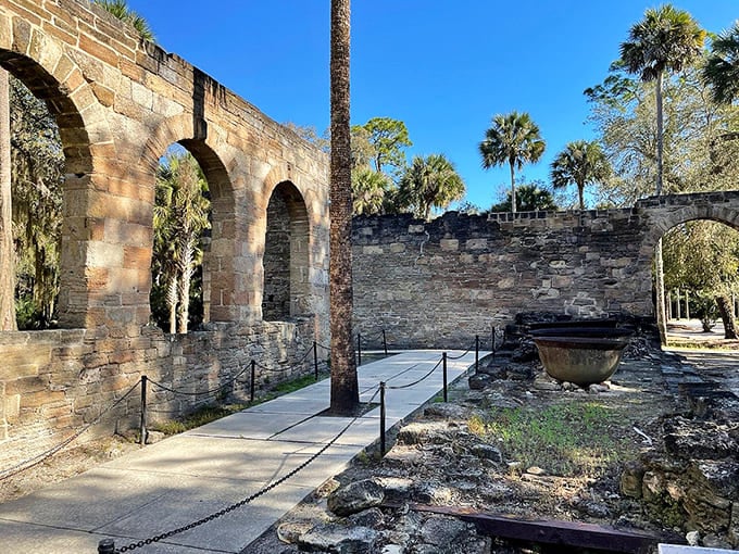 Weathered walls tell silent stories of sugar production, Seminole Wars, and the ambitious souls who built empires from seashells.