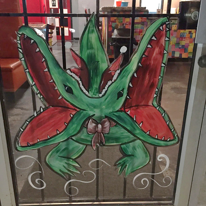 This painted door guardian combines holiday cheer with Floridian flair &ndash; Santa might need two cookies for this festive double-domed greeter!