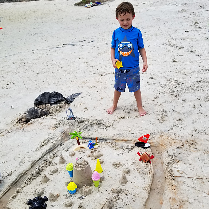 Childhood wonder comes alive as young explorers build sandcastles and discover the simple joys of a day by the water.