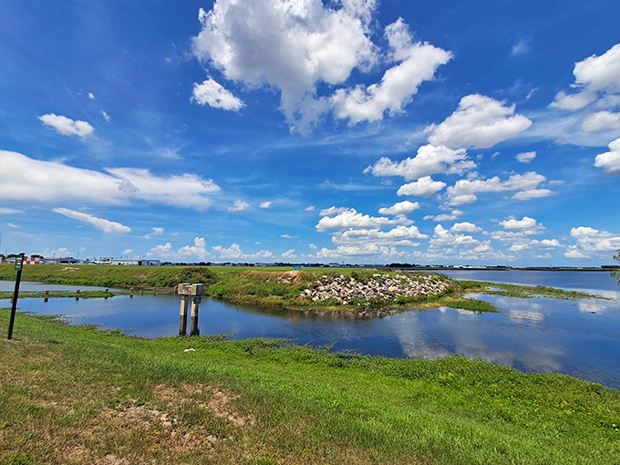 Lake Underhill's tranquil waters reflect the changing sky, offering anglers and daydreamers alike a front-row seat to nature's daily performance.