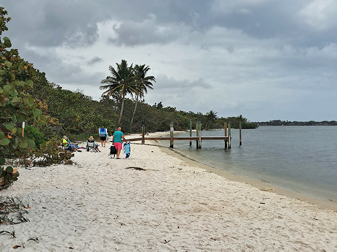 Beach-goers enjoy a slice of paradise without the crowds, proving that Florida's best experiences often happen away from the tourist brochures.