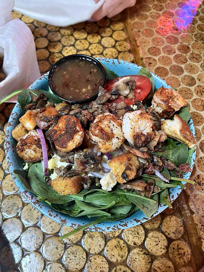 A spinach salad that actually makes you excited about eating greens &ndash; those blackened shrimp could convert any salad skeptic.