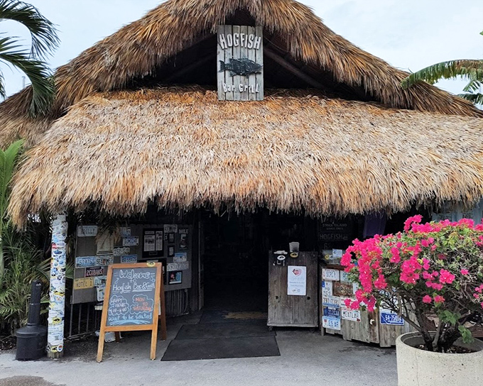 Hogfish Bar & Grill's authentic tiki hut roof provides the perfect tropical setting for enjoying the Keys' signature fish.