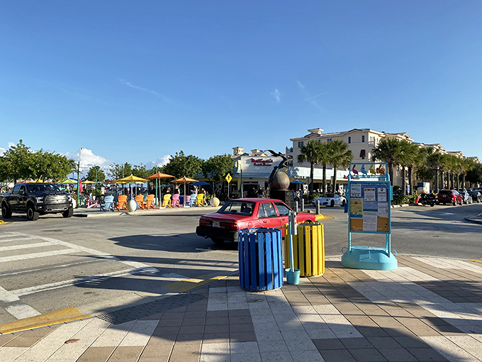 Lauderdale-By-The-Sea's beachfront buildings showcase classic Florida architecture with palm trees framing this seaside community.