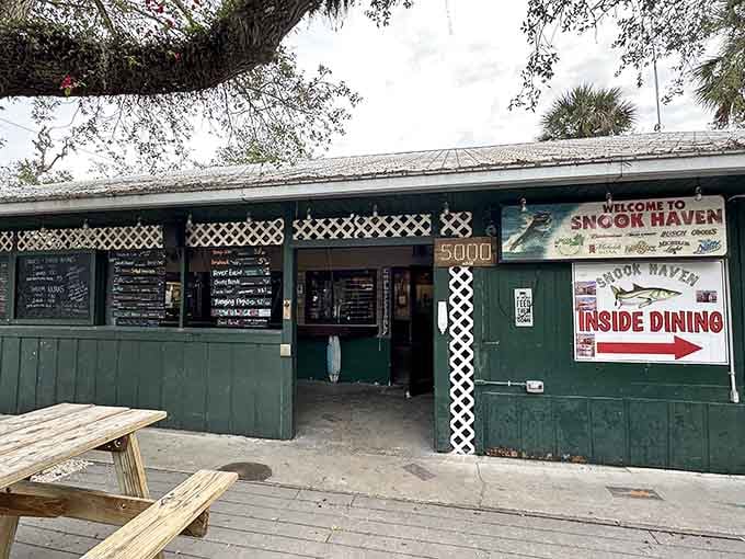 Snook Haven's rustic exterior welcomes you to a world where good food meets the Myakka River and time slows down beautifully.