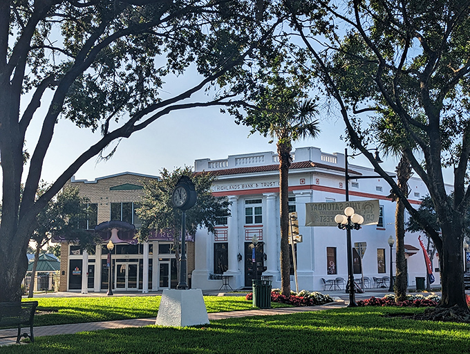 Sebring's town square showcases historic architecture surrounding a central green space, creating a gathering place for community events.