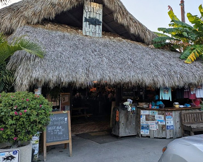 Colorful flowers brighten the entrance to this hidden Keys gem, where the hogfish sandwich has achieved legendary status.