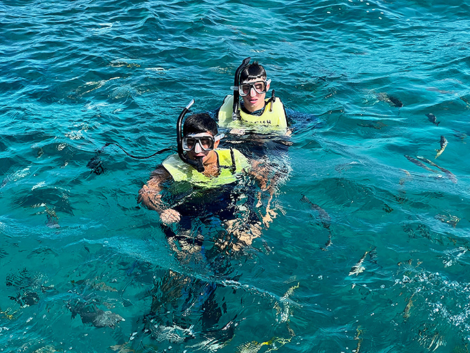 When fish outnumber people, you know you've found the right snorkeling spot! These swimmers have discovered one of Florida's underwater highways where marine traffic never stops.
