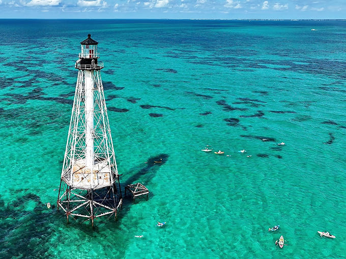 From above, you can see why sailors needed this beacon; those coral formations are beautiful but treacherous, like nature's own obstacle course.