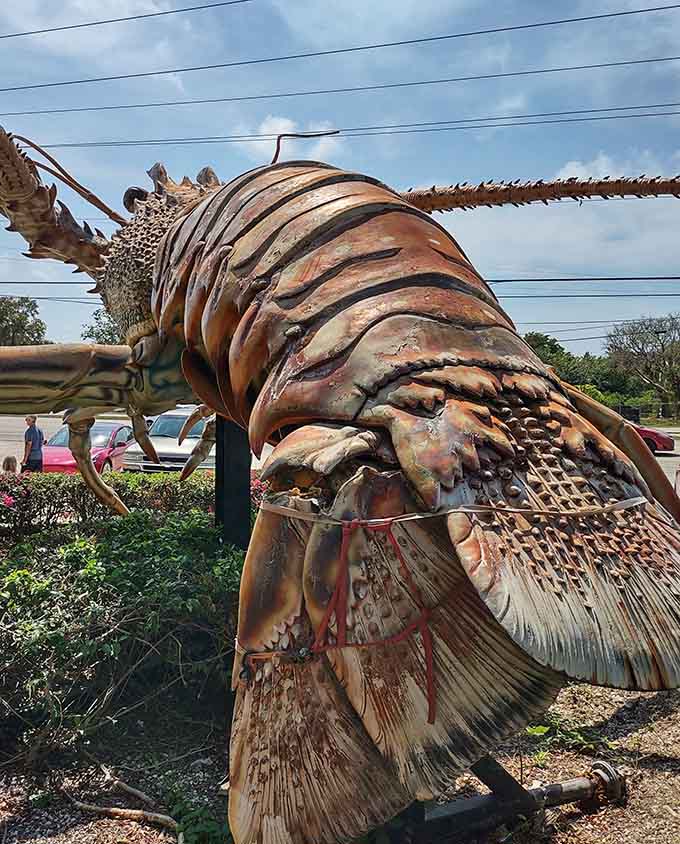 Betsy's tail section showcases the artistic attention to detail that went into creating this beloved roadside icon, each segment carefully sculpted and painted.