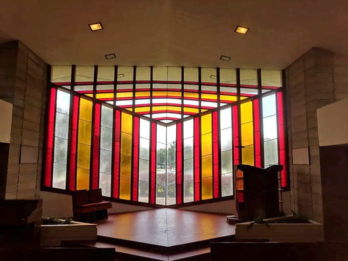 Inside Danforth Chapel, stained glass transforms sunlight into a warm embrace, creating the perfect space for quiet contemplation.