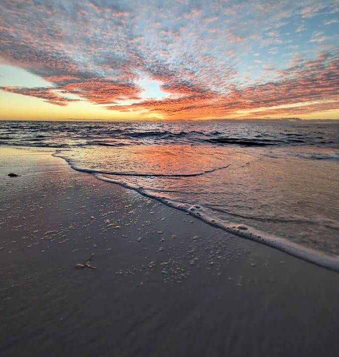 When the sky puts on this kind of show, you realize why sunset at Clam Pass beats any television program ever made.