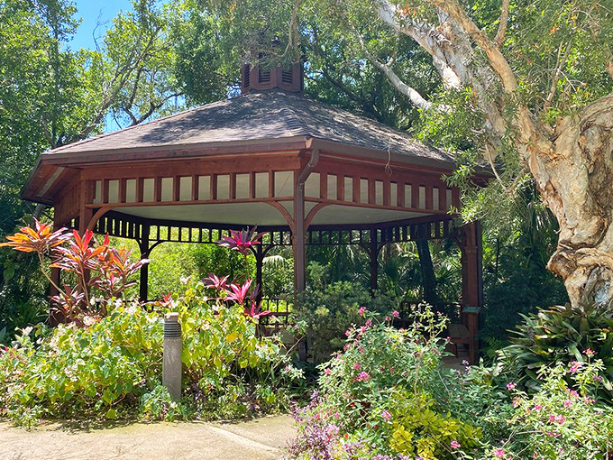 This wooden gazebo, embraced by lush gardens, offers a moment of zen where time slows and inspiration flows freely.