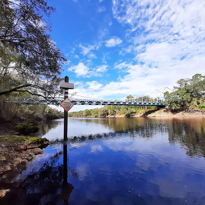 Distance makes the bridge look delicate, like a piece of jewelry draped across the river, but get closer and you'll appreciate its solid strength.