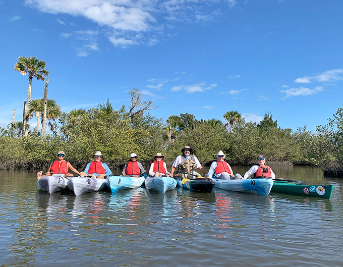 The kayak committee convenes on the Intracoastal Waterway. Six paddlers, countless birds, zero traffic jams.
