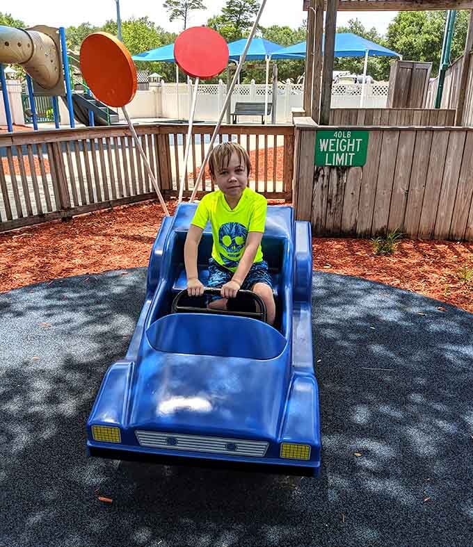 That moment when a simple ride-on toy becomes a luxury vehicle in a child's imagination, complete with invisible cup holders.