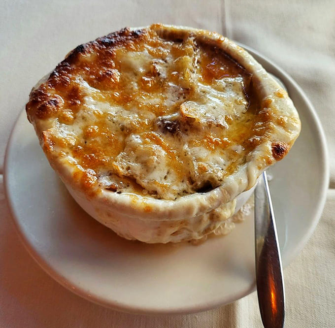 French onion soup with a cheese blanket so thick you'll need a spoon and a strategy.